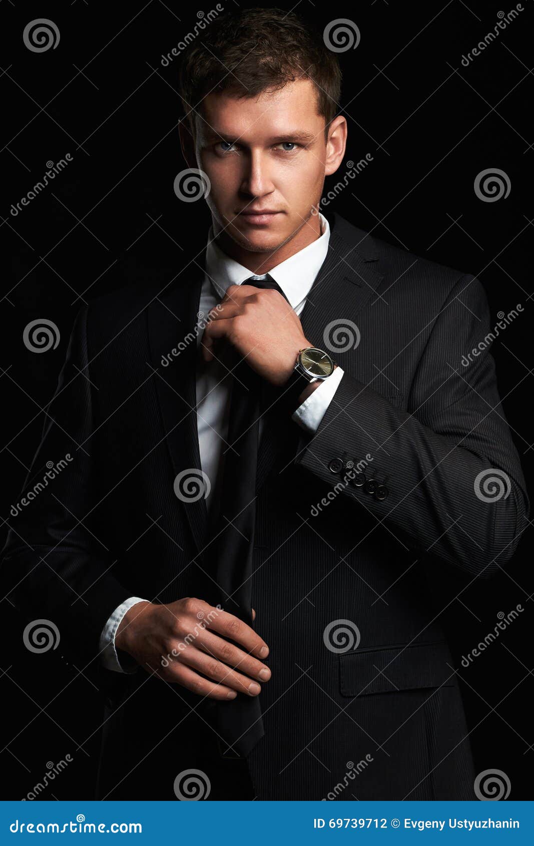 Businessman Standing On Black Background Handsome Young Man In Suit