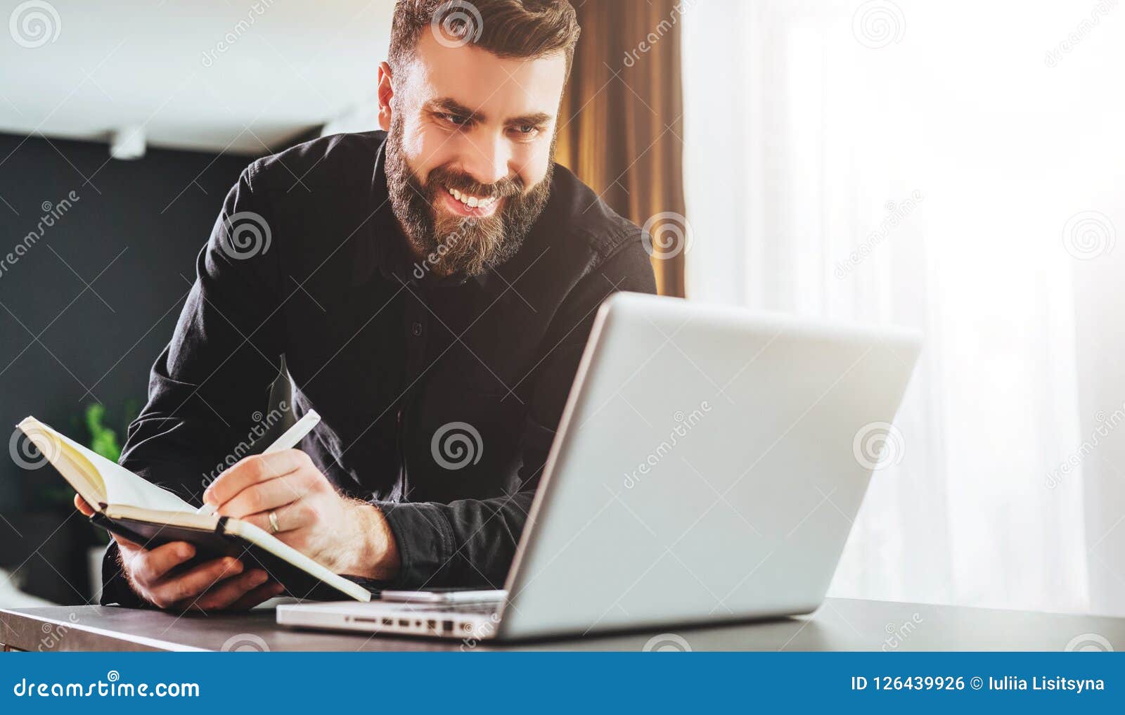 Businessman is Standing by Computer, Looking at Laptop Screen, Making ...