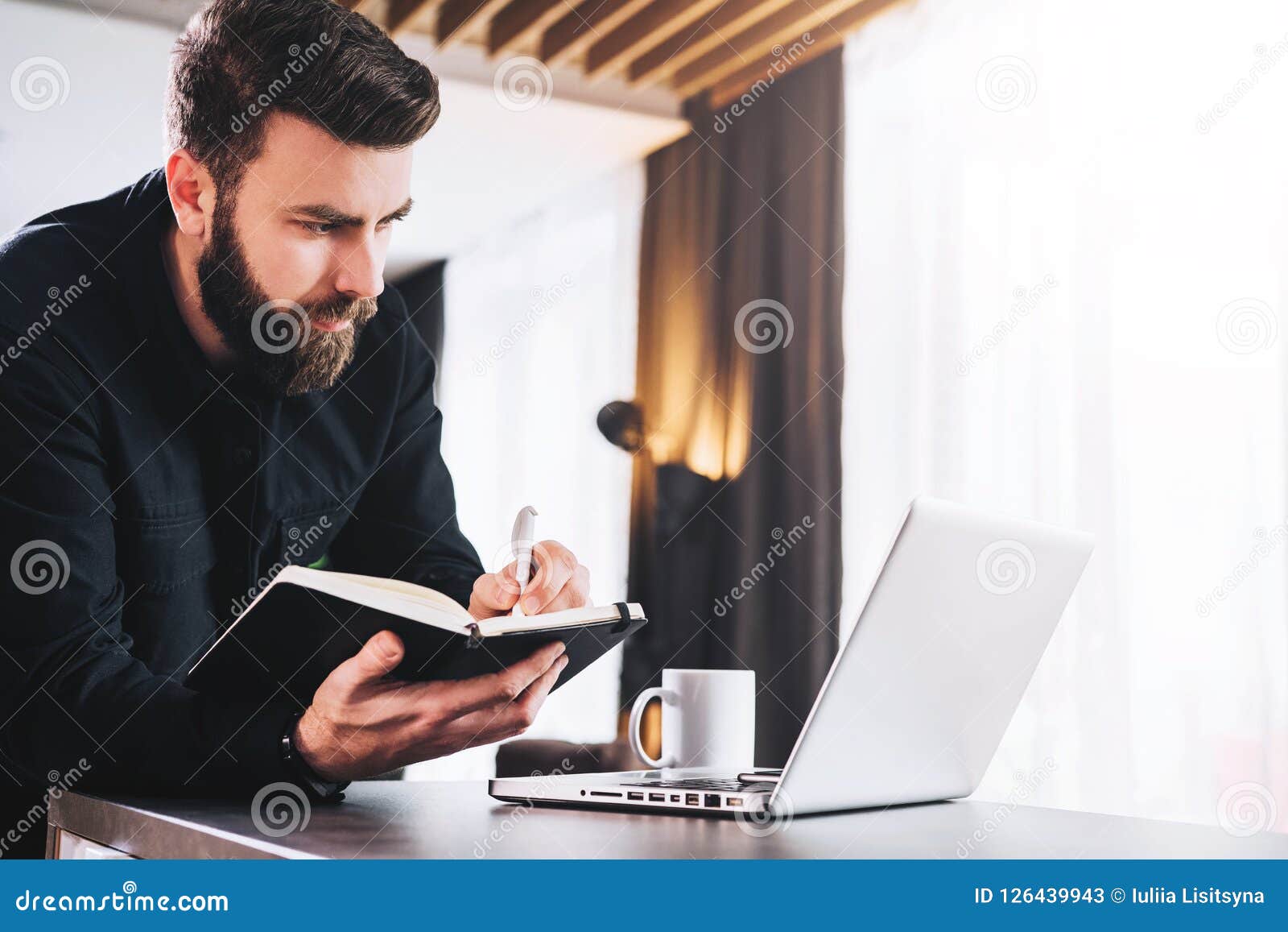 Businessman is Standing by Computer, Looking at Laptop Screen, Making ...
