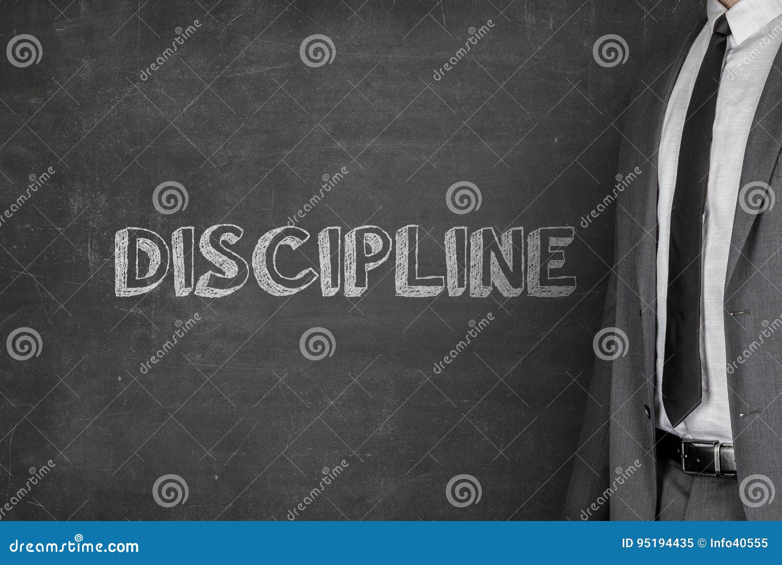 Businessman Standing by Discipline Text on Blackboard Stock Image ...