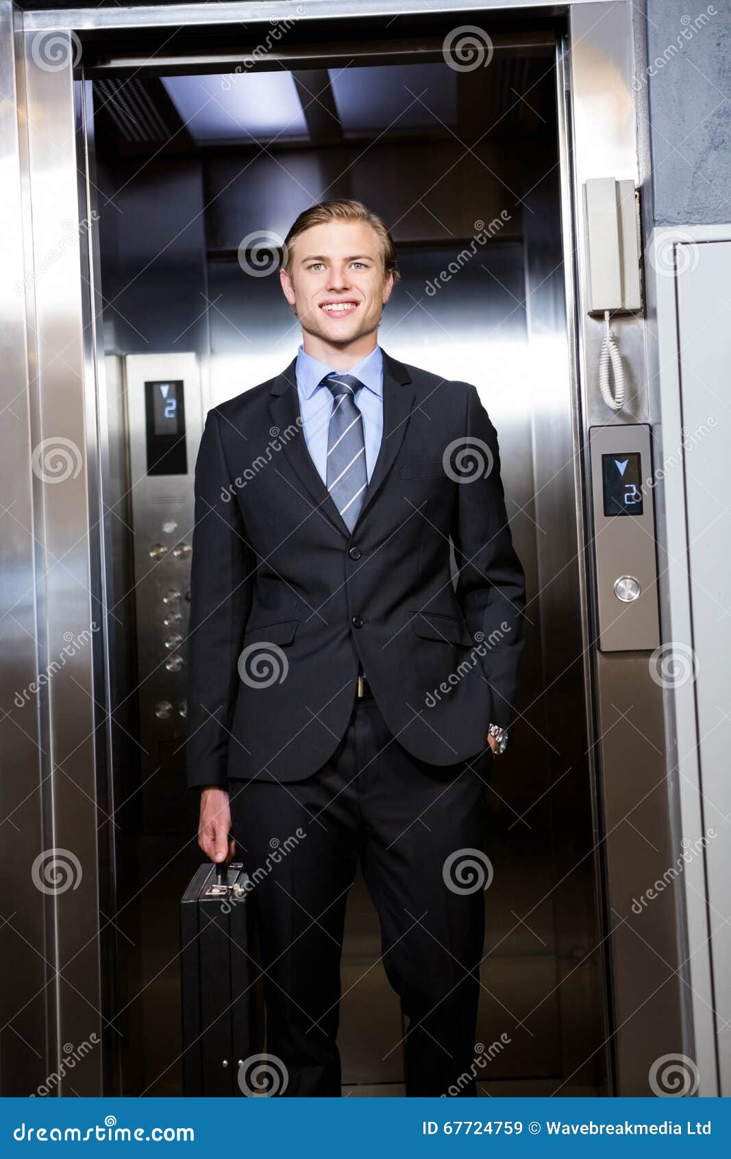 Businessman Standing in an Elevator Stock Image - Image of caucasian ...