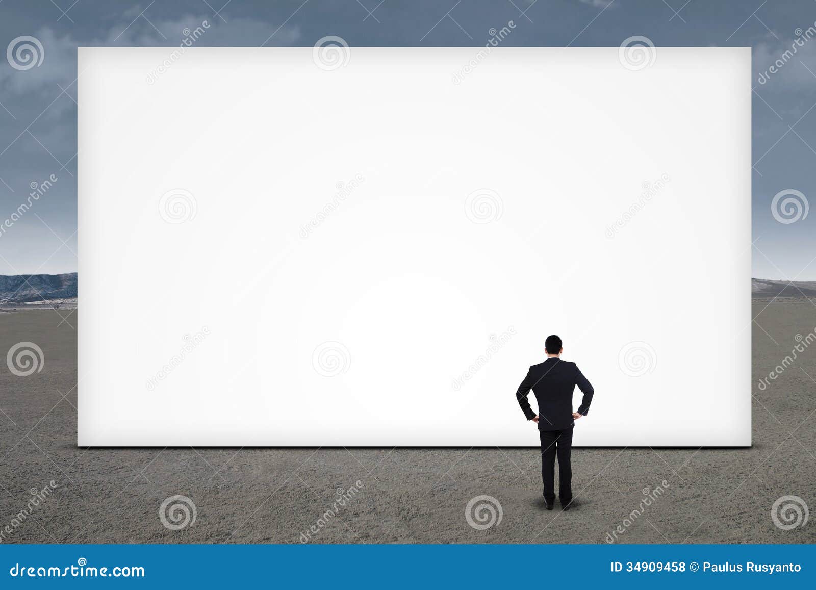 Businessman Standing in Front of Empty Board Stock Photo - Image of ...