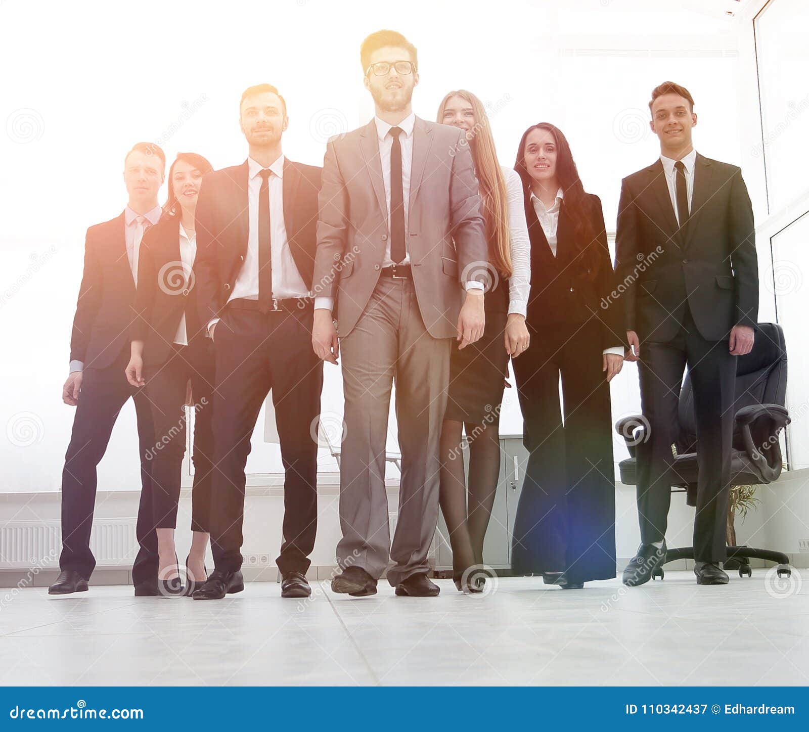Businessman Standing in Front of Her Business Team Stock Image - Image ...
