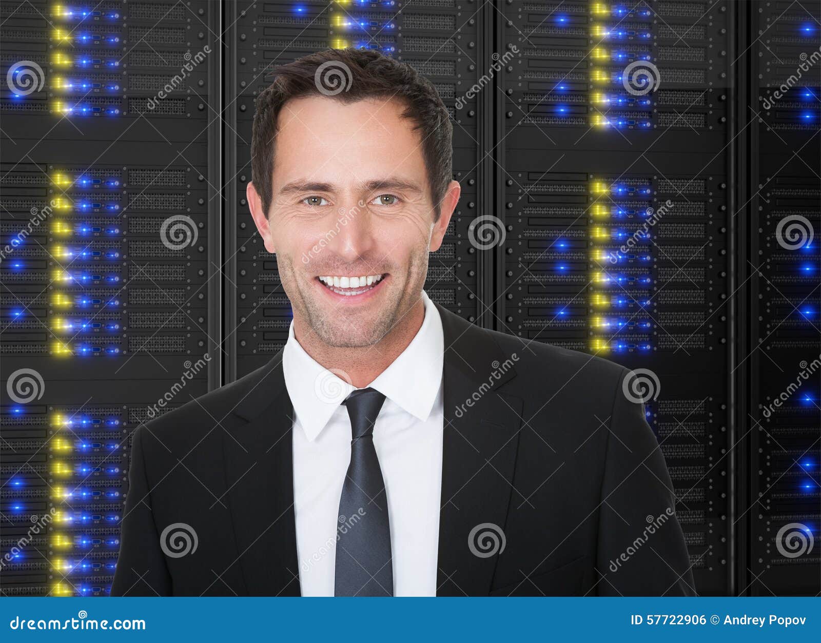 Businessman Standing in Front of Server Racks Stock Photo - Image of ...
