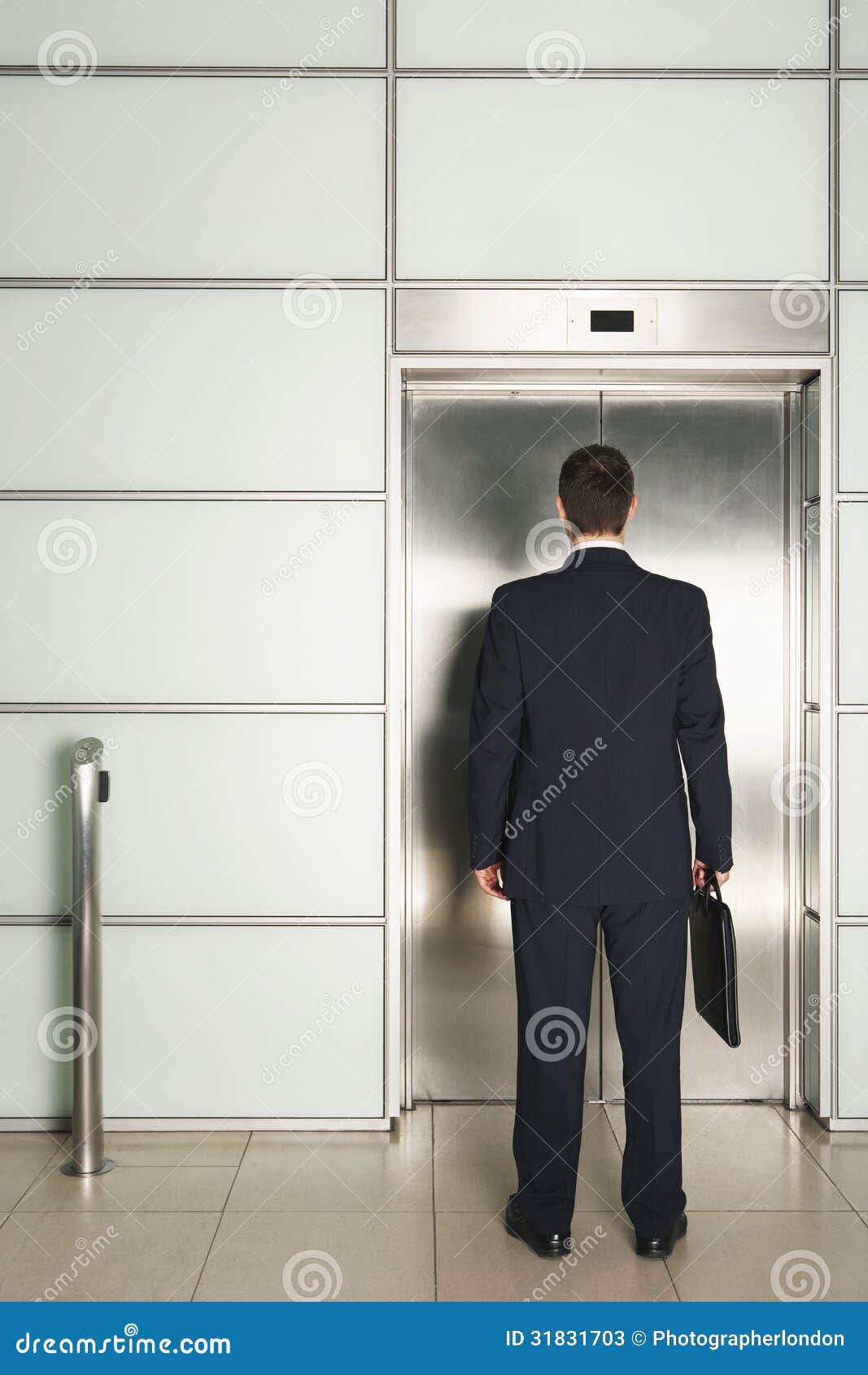 Businessman Standing in Front View Elevator Stock Image - Image of ...