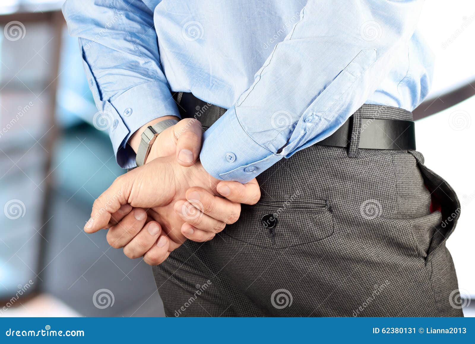 Businessman Standing with Hands Behind His Back. Stock Image - Image of ...
