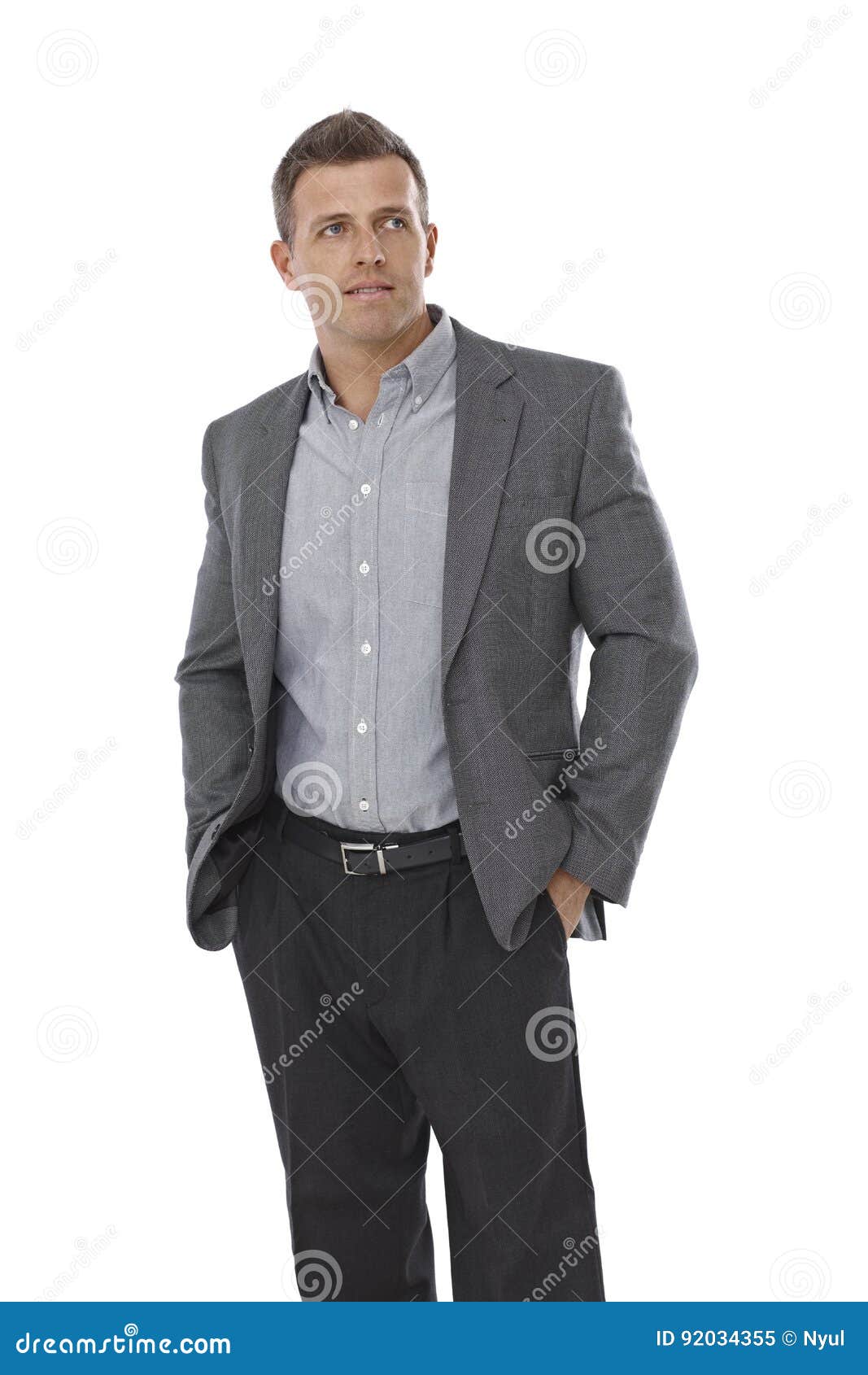 Businessman Standing with Hands in Pockets Stock Image - Image of ...