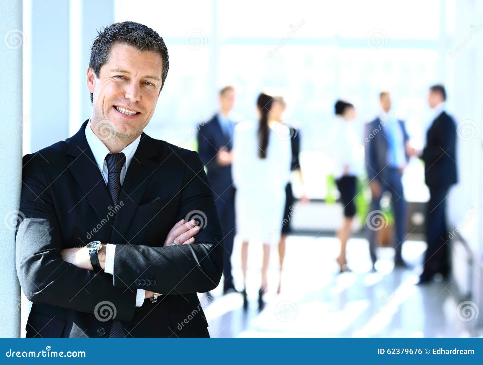 Businessman standing stock photo. Image of group, face - 62379676