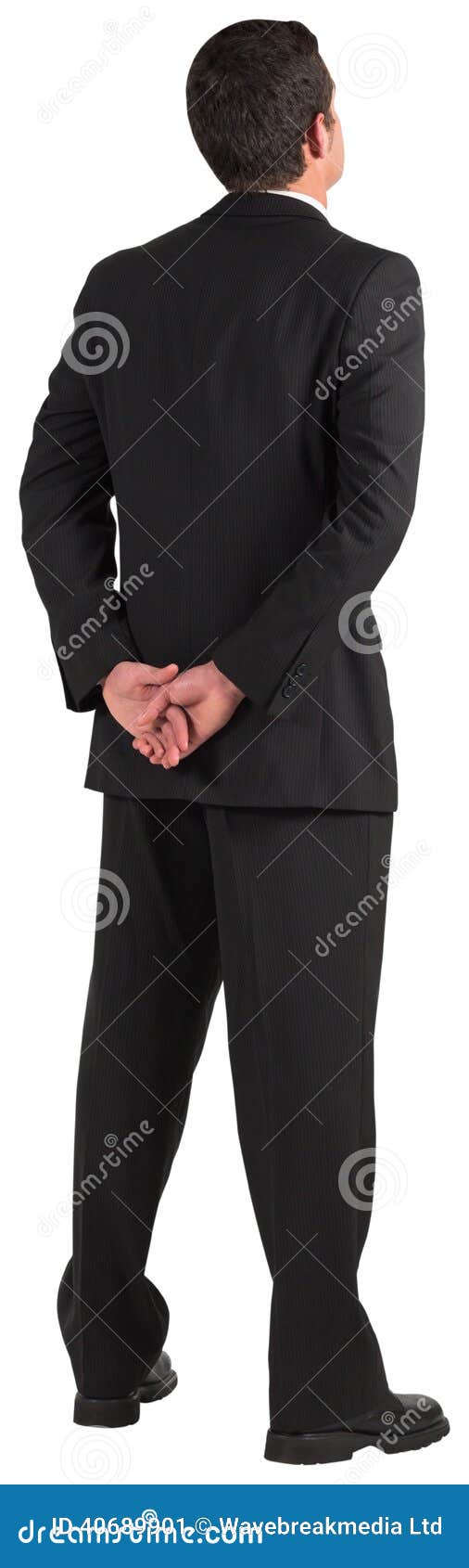 Businessman Standing and Looking with Hands Behind Back Stock Image ...