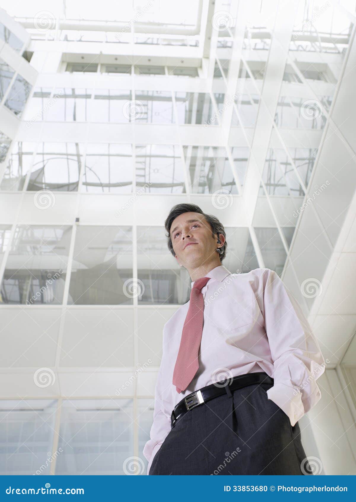 Atrium Of An Office Building With A Large Reception Desk, Granite ...