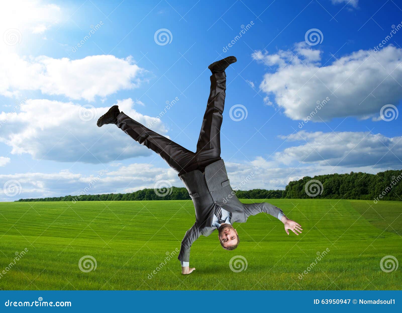 Businessman Standing on One Hand Stock Image - Image of costume ...