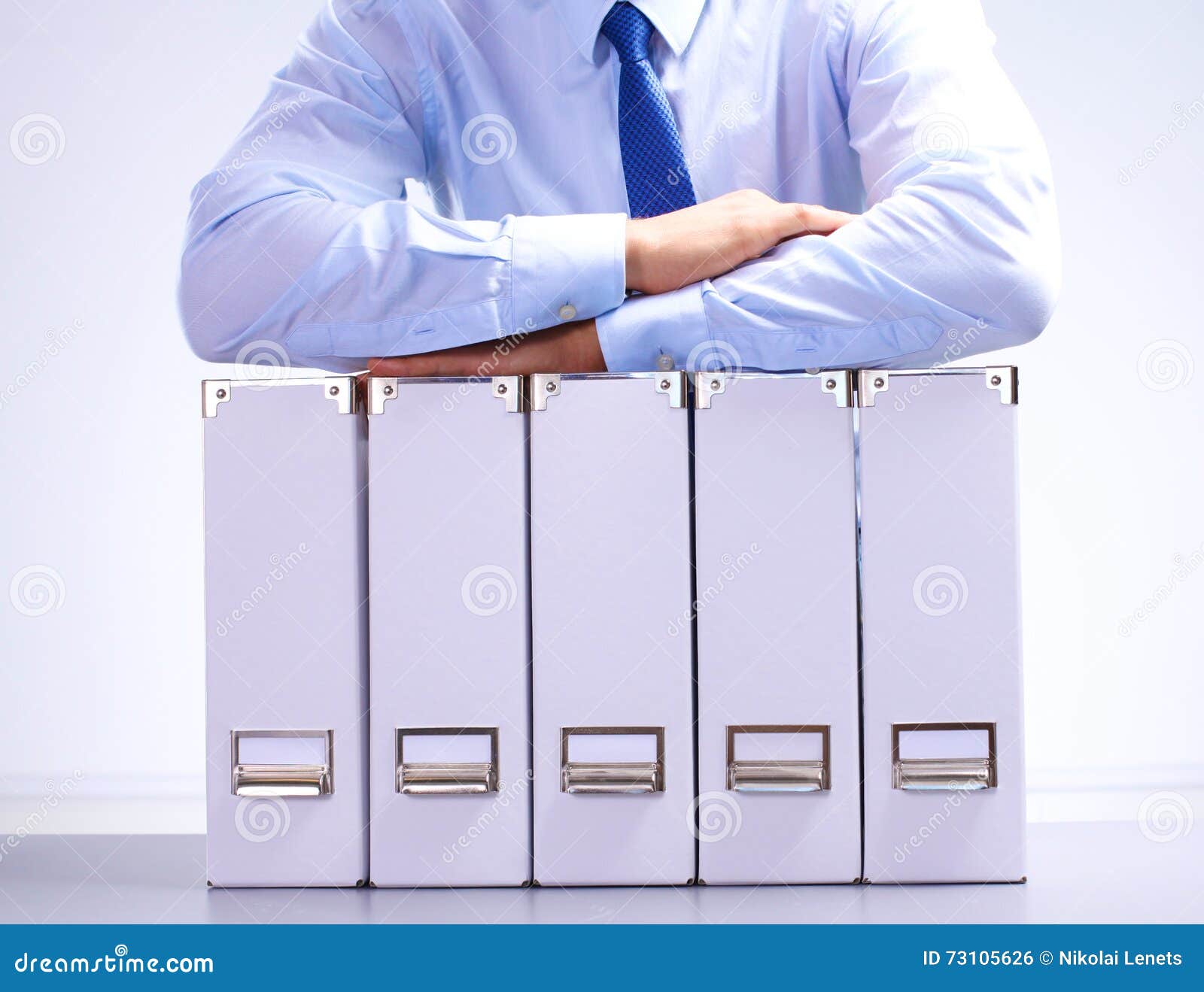 Businessman Standing Over a Folder with Documents Stock Photo - Image ...