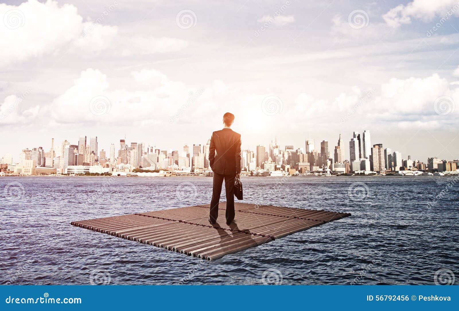Businessman Standing on Raft Stock Photo - Image of businessman, ocean ...