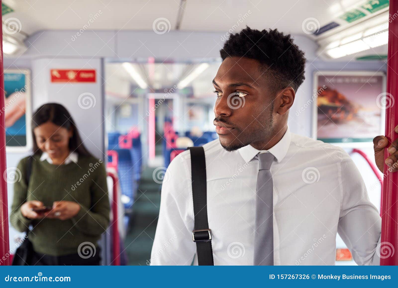 Businessman Standing in Train Commuting To Work Stock Photo - Image of ...