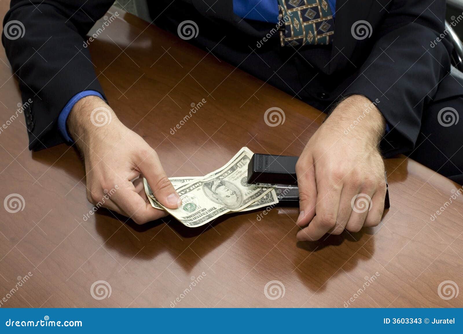 Businessman stapling stock image. Image of money, twenties - 3603343