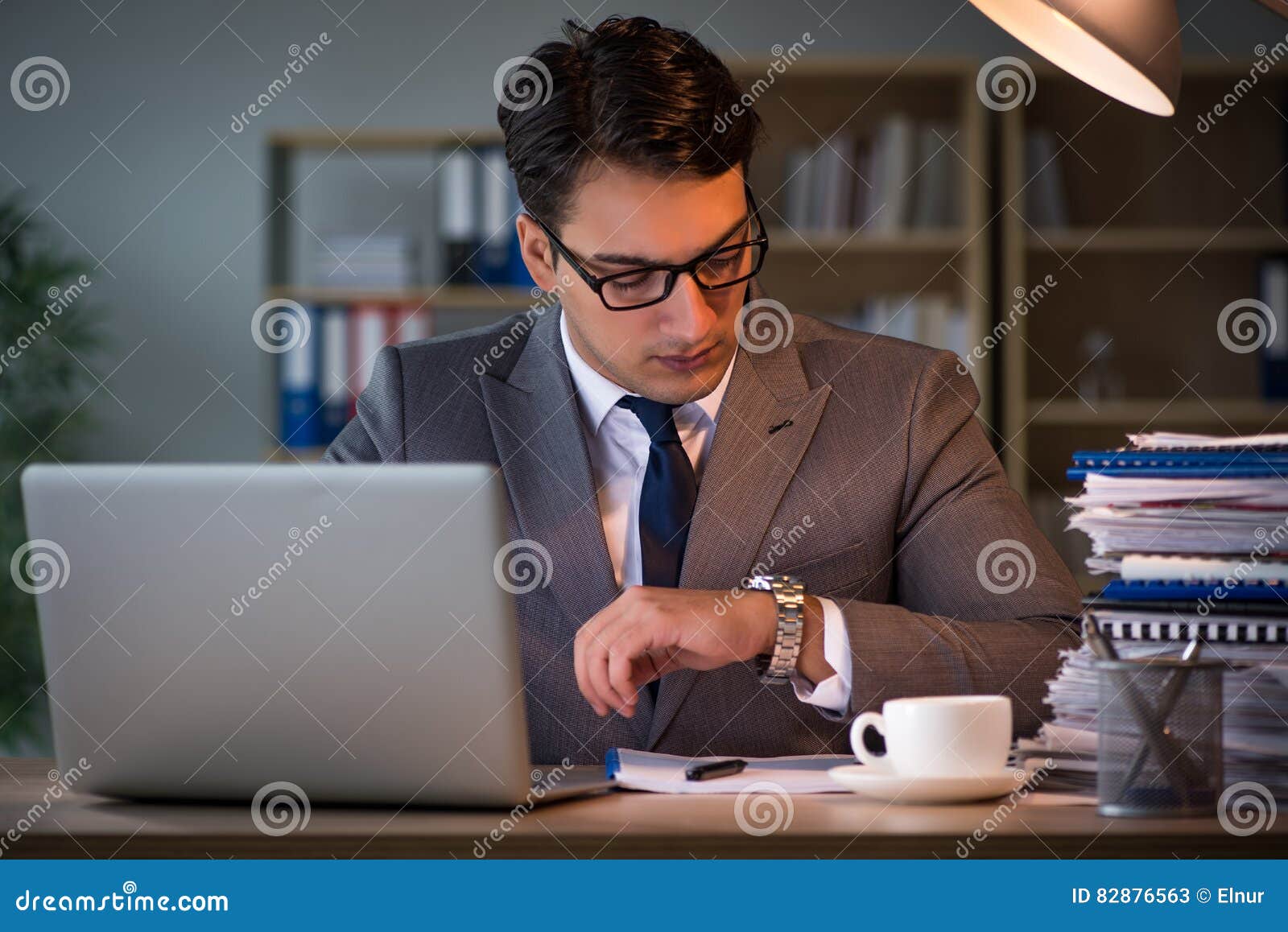 The Businessman Staying in the Office for Long Hours Stock Image ...