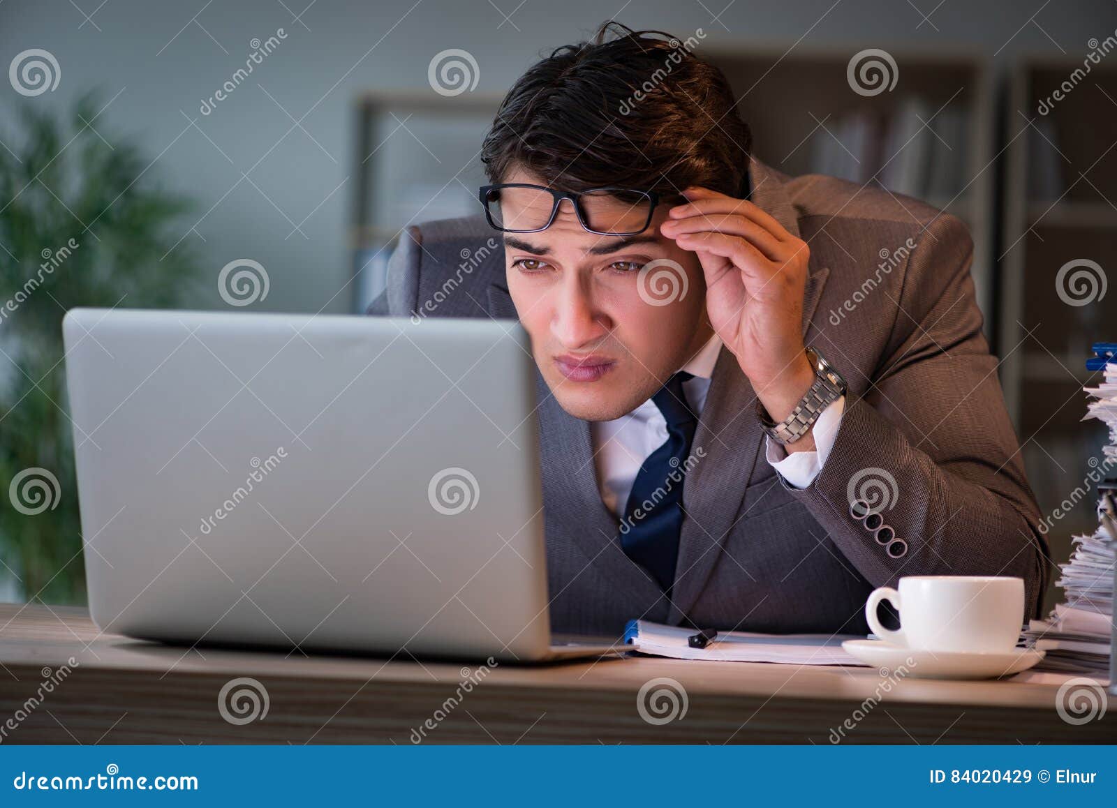 The Businessman Staying in the Office for Long Hours Stock Image ...