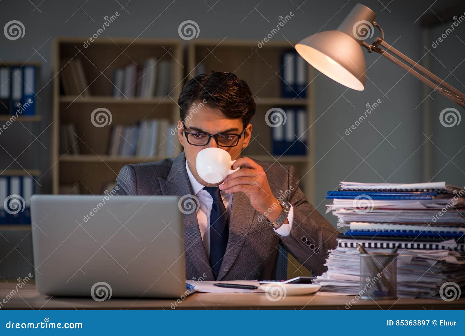 The Businessman Staying in the Office for Long Hours Stock Image ...