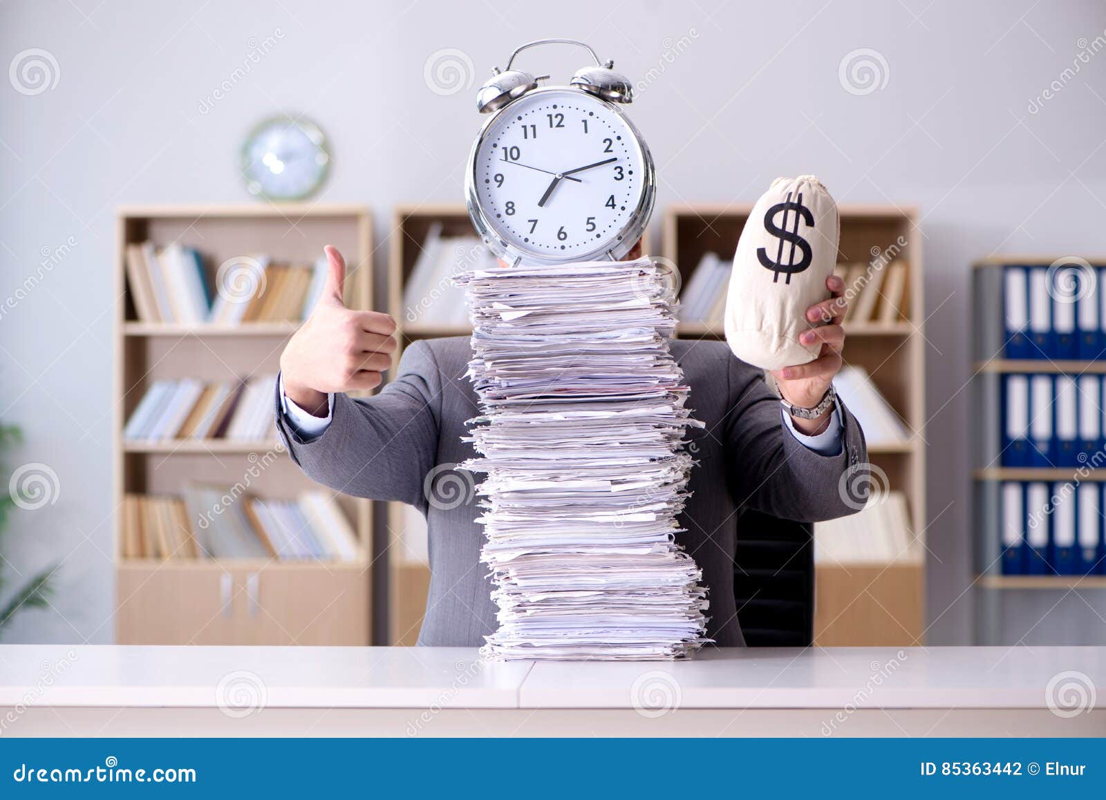 The Businessman Struggling To Meet Challenging Deadlines Stock Photo ...