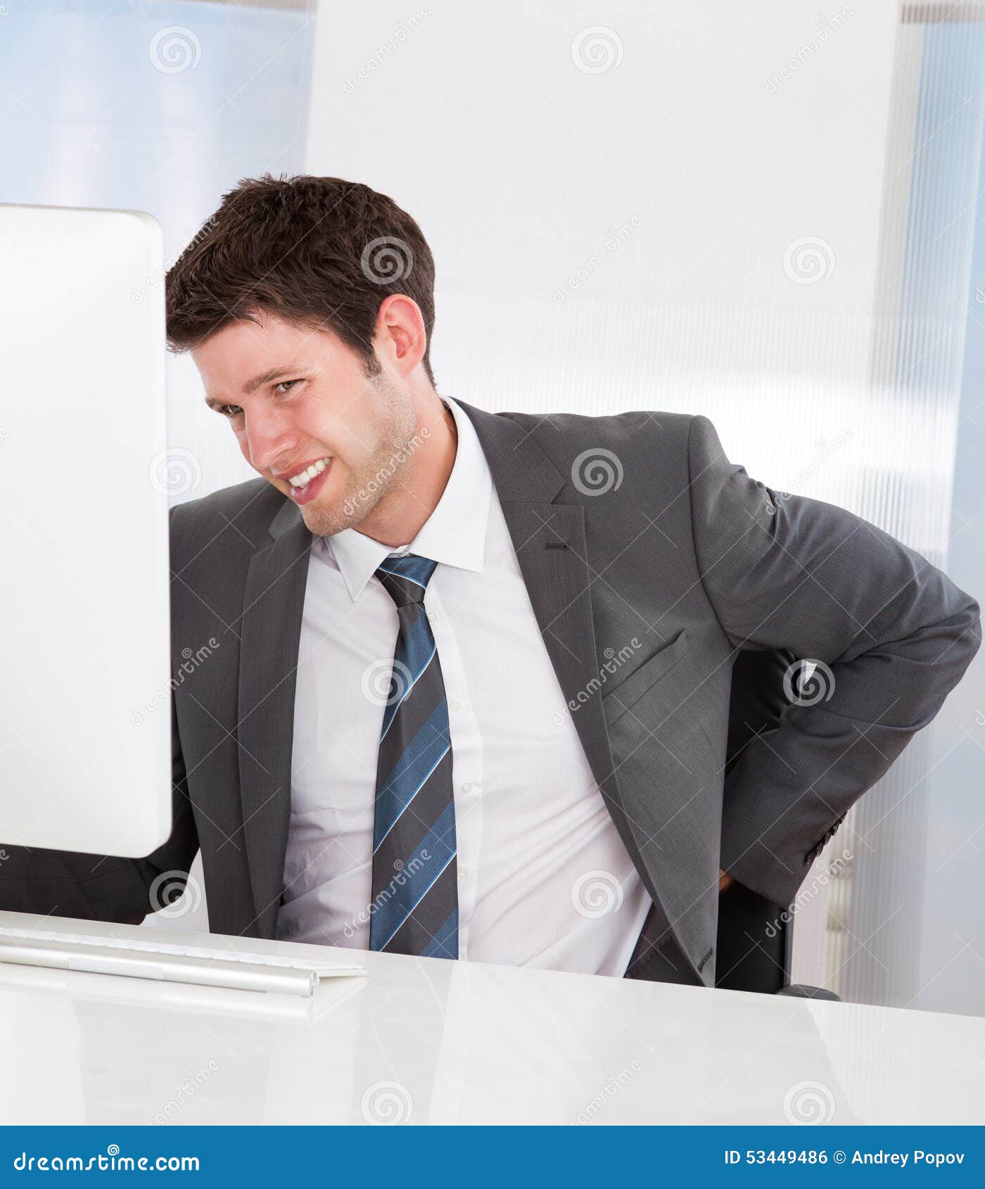 Businessman Suffering from Back Pain Stock Photo - Image of desk ...