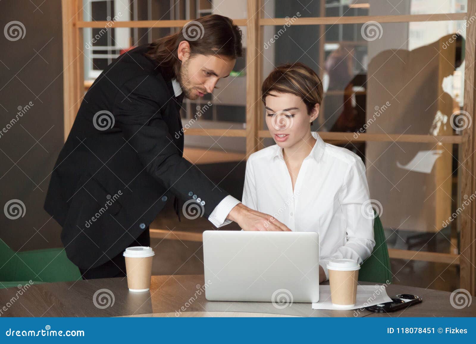Male Leader Helping Partner Assisting with Online Startup Stock Image ...