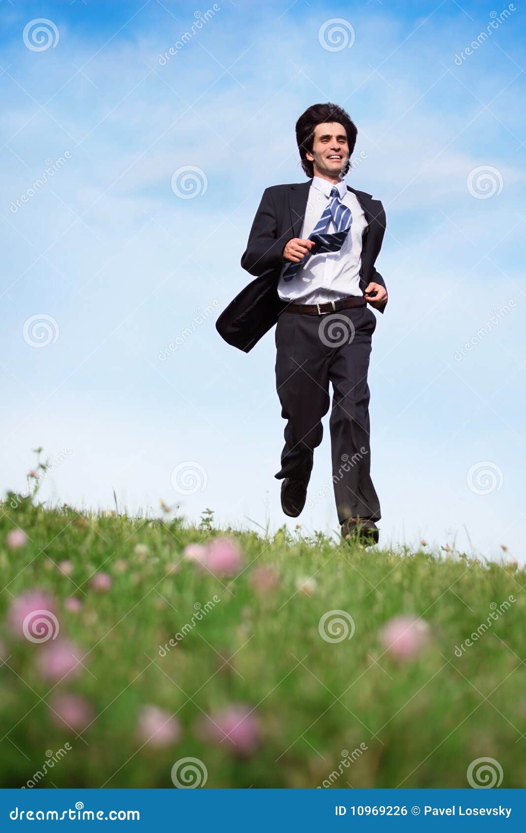 Businessman in Suit Running on Meadow Stock Photo - Image of flower ...