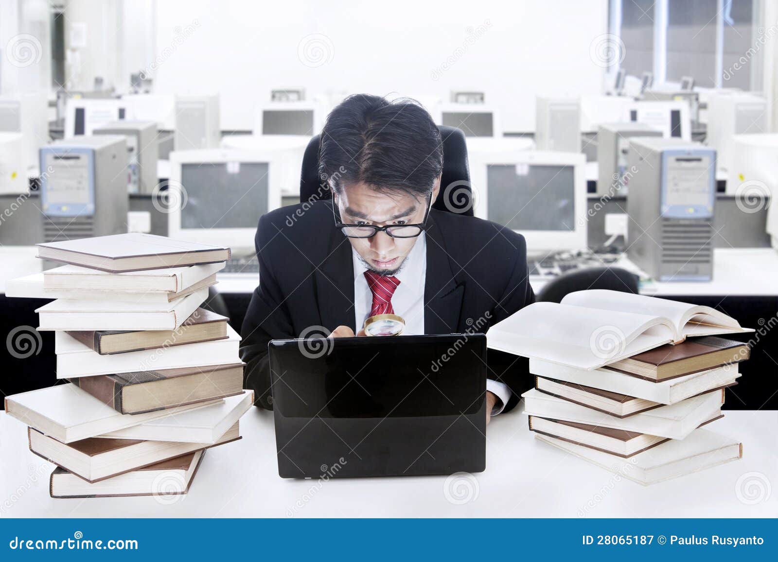 Businessman Surrounded with Books and Computer Stock Image - Image of ...