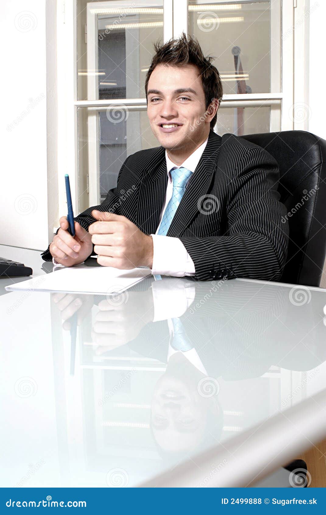 Businessman at table stock photo. Image of office, male - 2499888