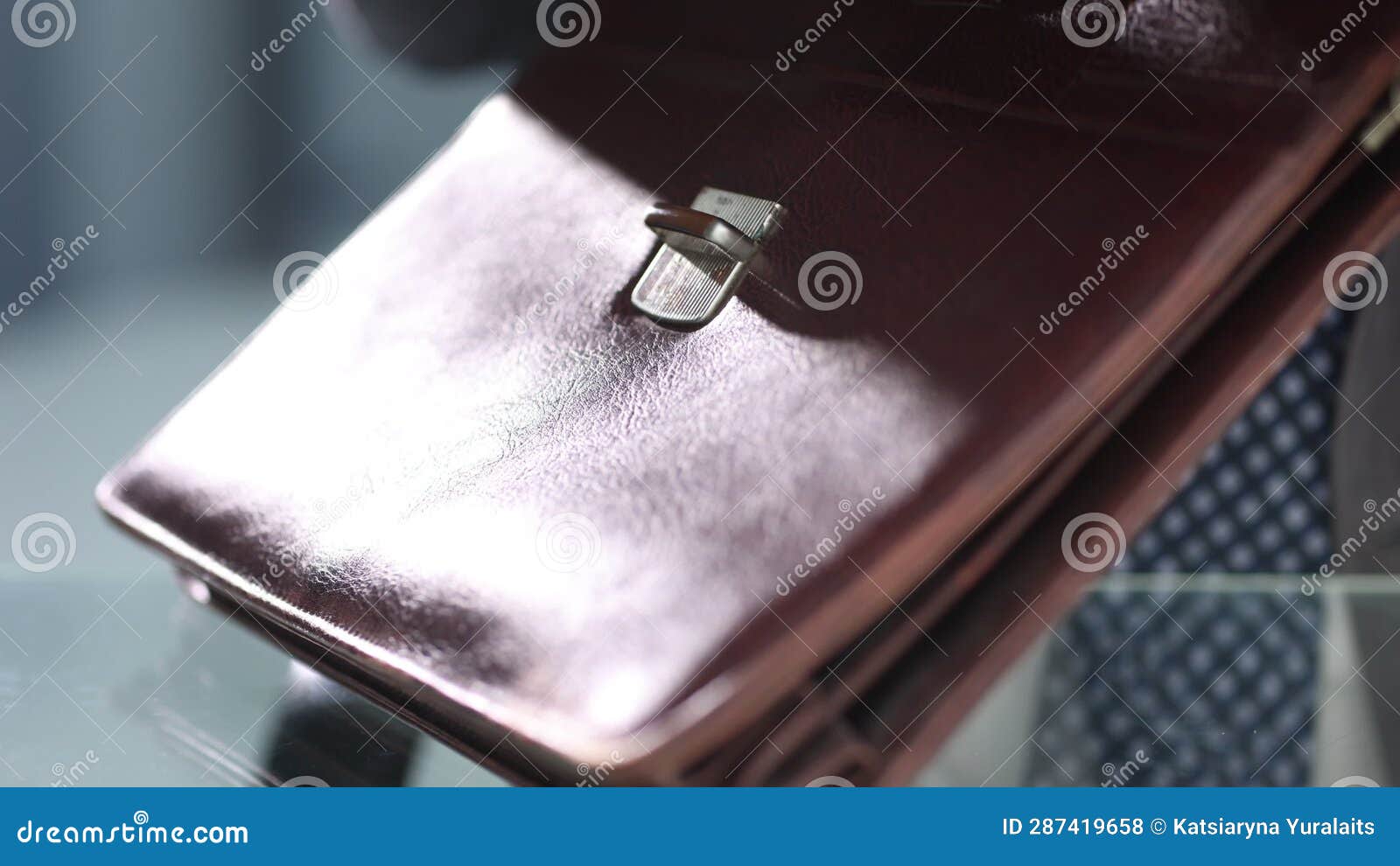 Lawyer Opens a Briefcase with Documents Sitting at a Table in the ...