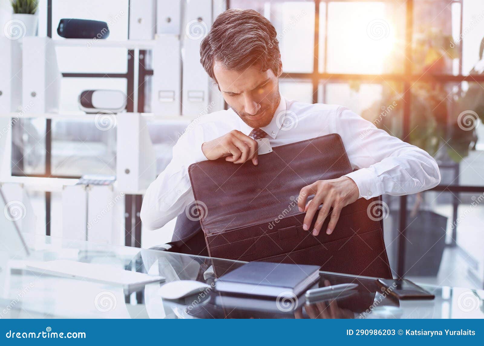 Businessman by Table and Opening His Briefcase Stock Image - Image of ...