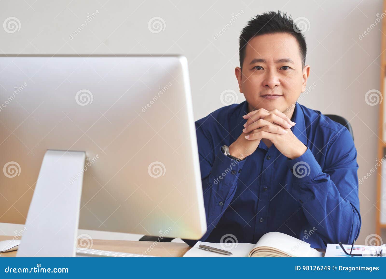 Businessman at table stock image. Image of professional - 98126249