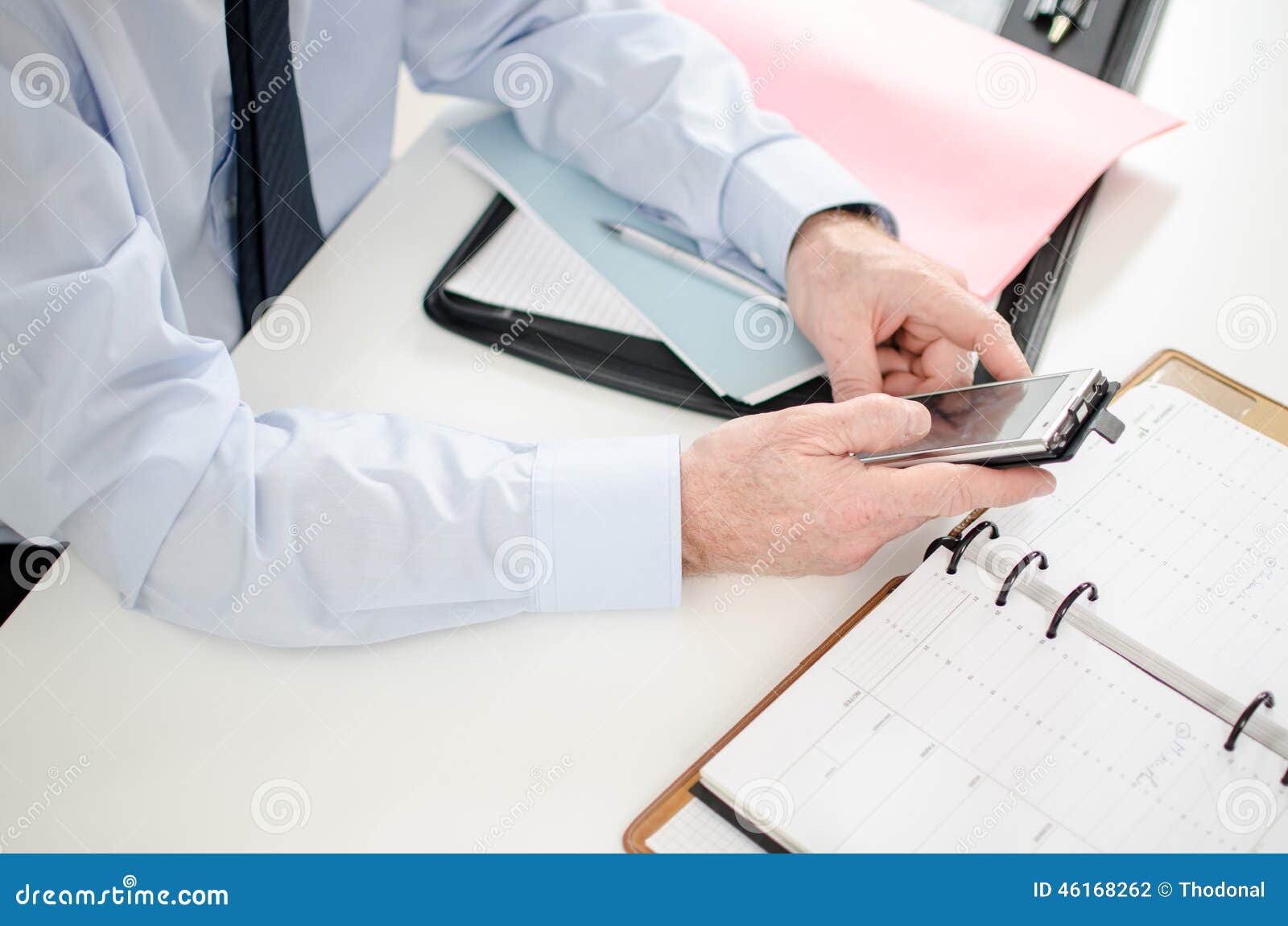 Businessman Taking an Appointment Stock Photo - Image of white, call ...