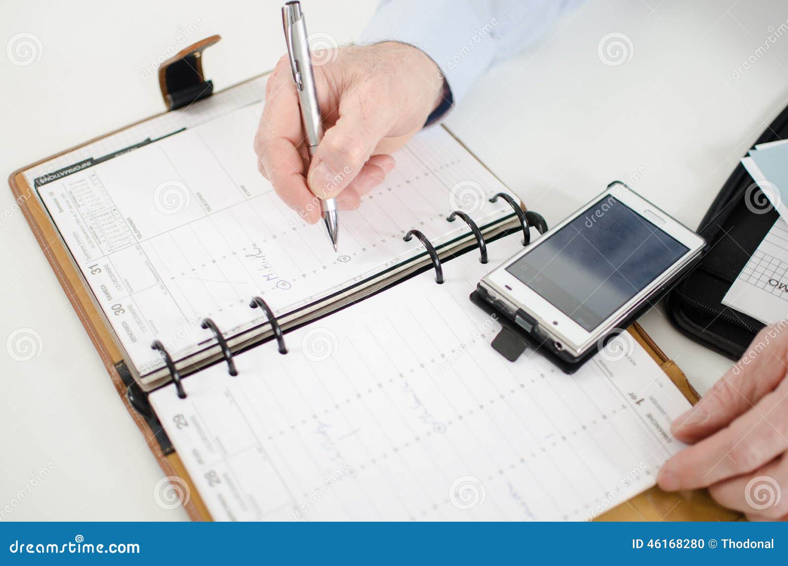 Businessman Taking an Appointment Stock Photo - Image of writing ...