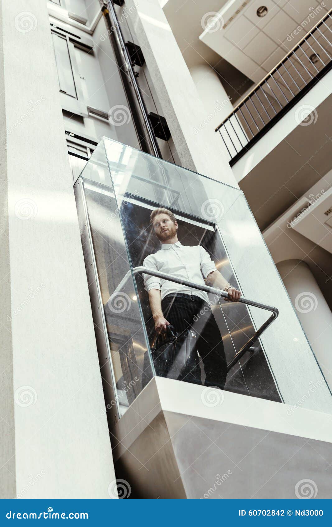 Businessman Taking the Elevator Stock Photo - Image of business, people ...