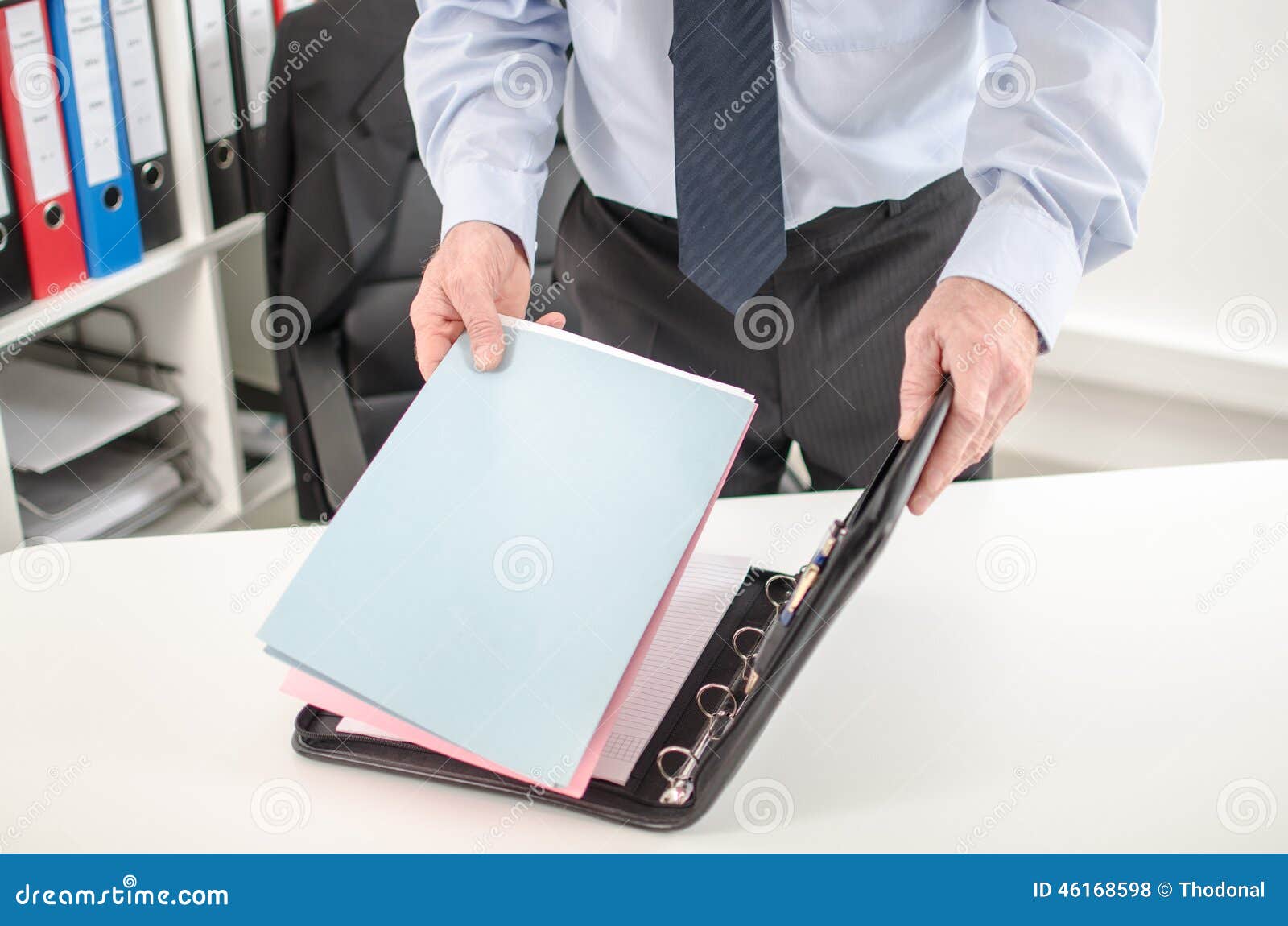 Businessman Taking Folder from His Briefcase Stock Photo - Image of ...