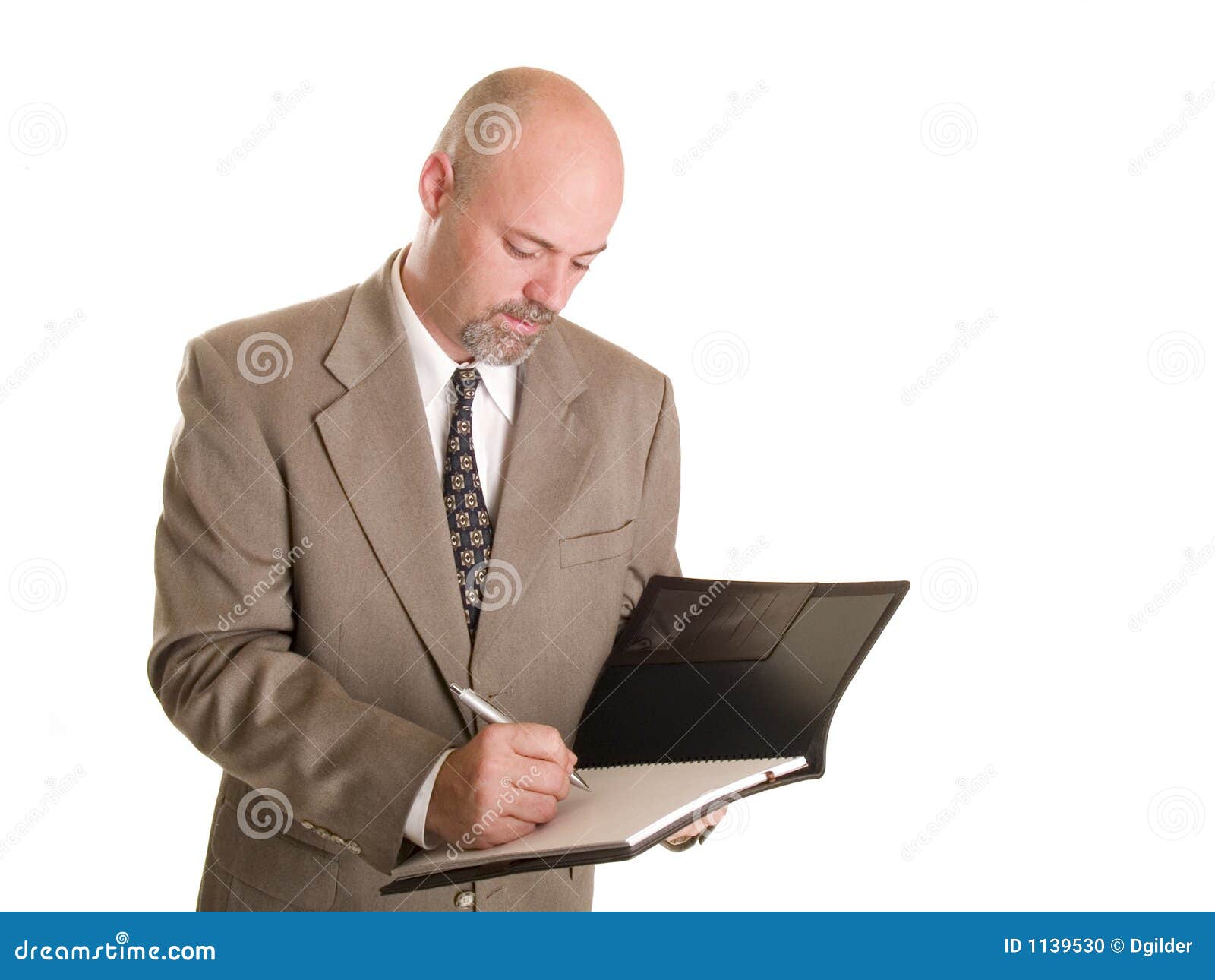 Businessman taking notes stock photo. Image of confidence - 1139530