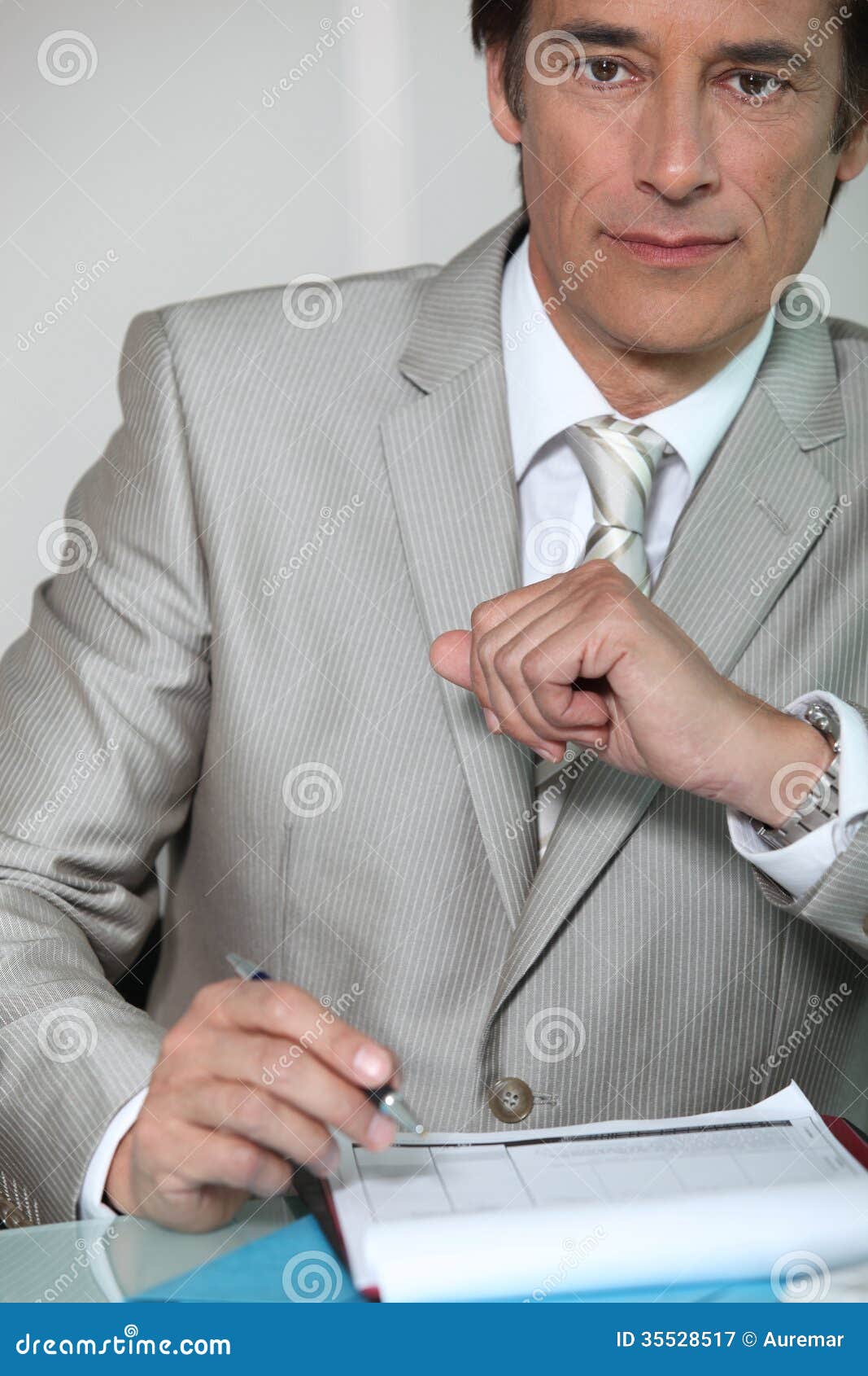 Businessman taking notes stock image. Image of business - 35528517
