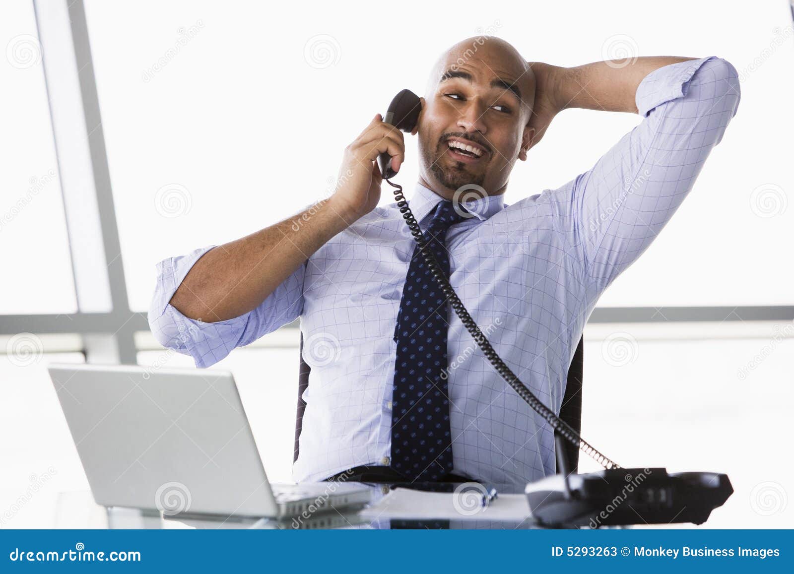 Businessman Taking Phone Call Stock Image - Image of male, eastern: 5293263