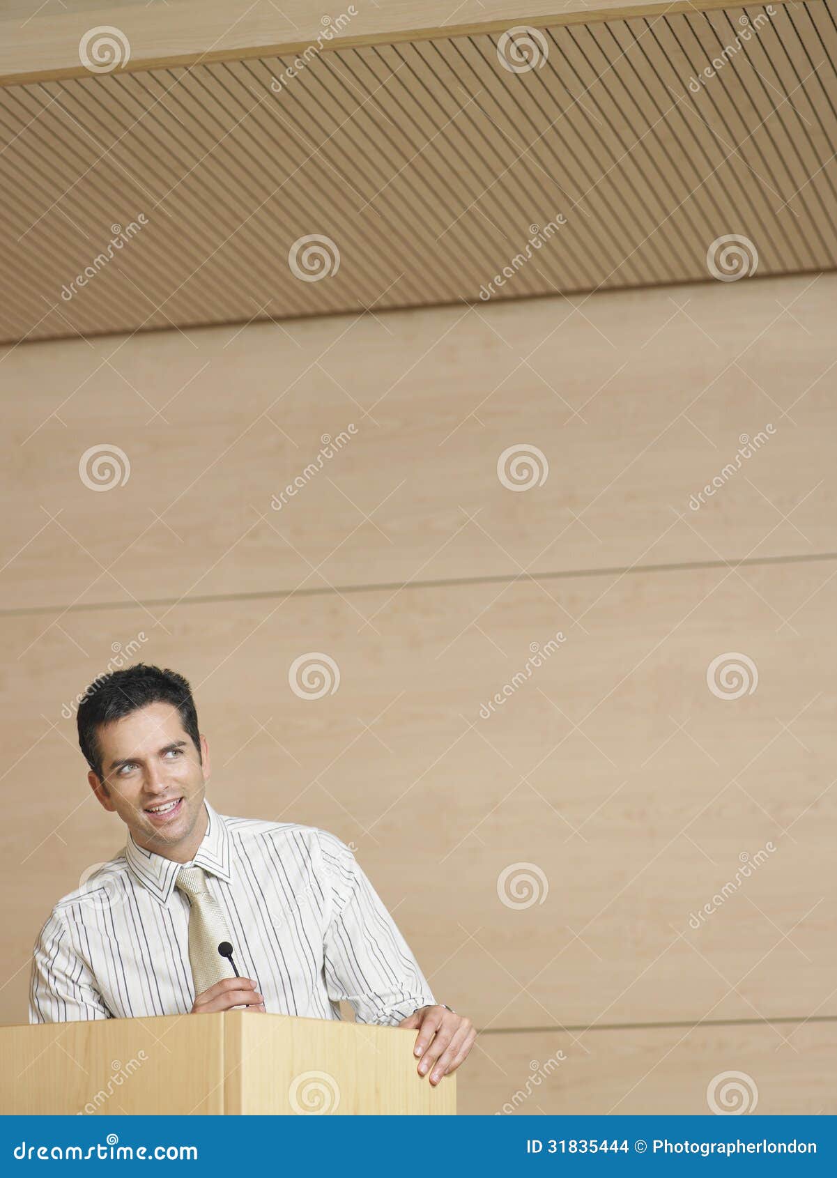 Businessman Talking into Microphone Stock Photo - Image of conference ...