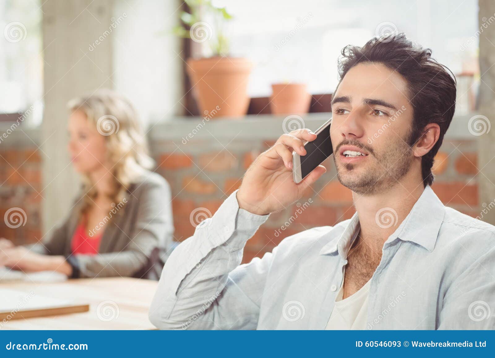 Businessman Talking Over Phone in Office Stock Image - Image of people ...