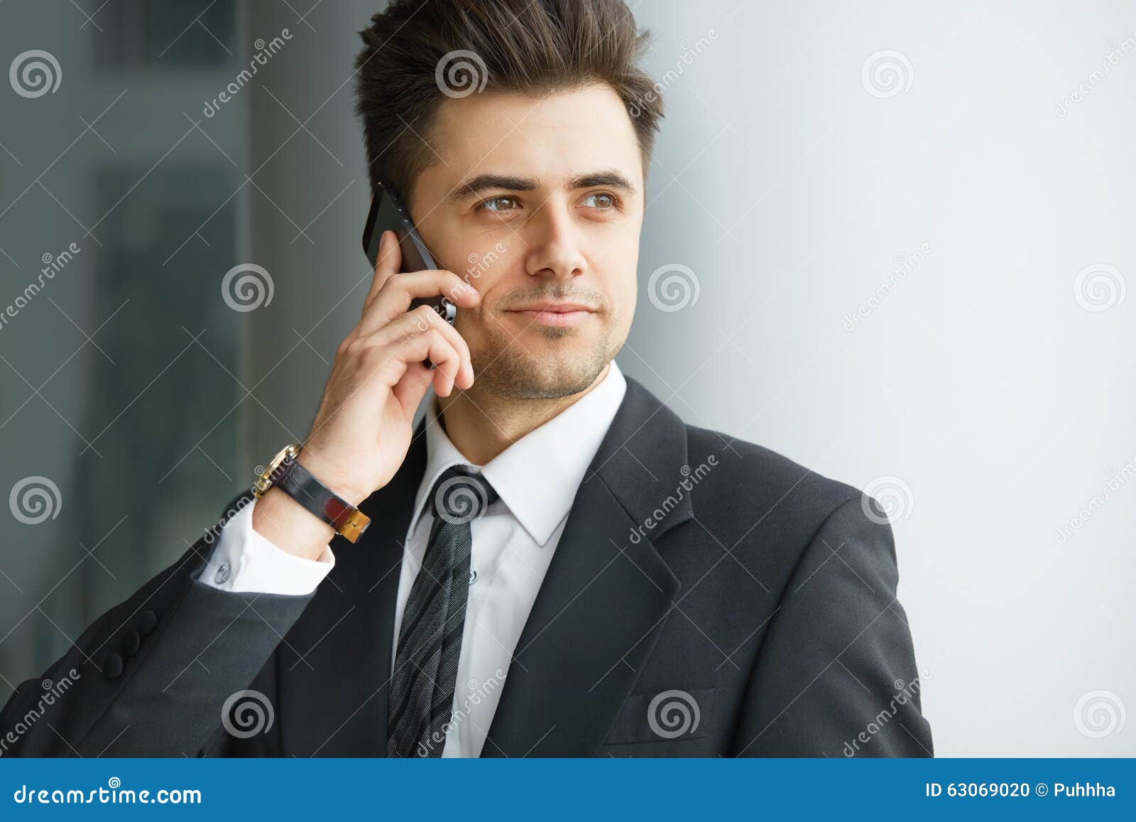 Businessman Talking on the Phone and Smiling Stock Photo - Image of ... Businessman Talking on the Phone and Smiling Stock Photo - Image of ...