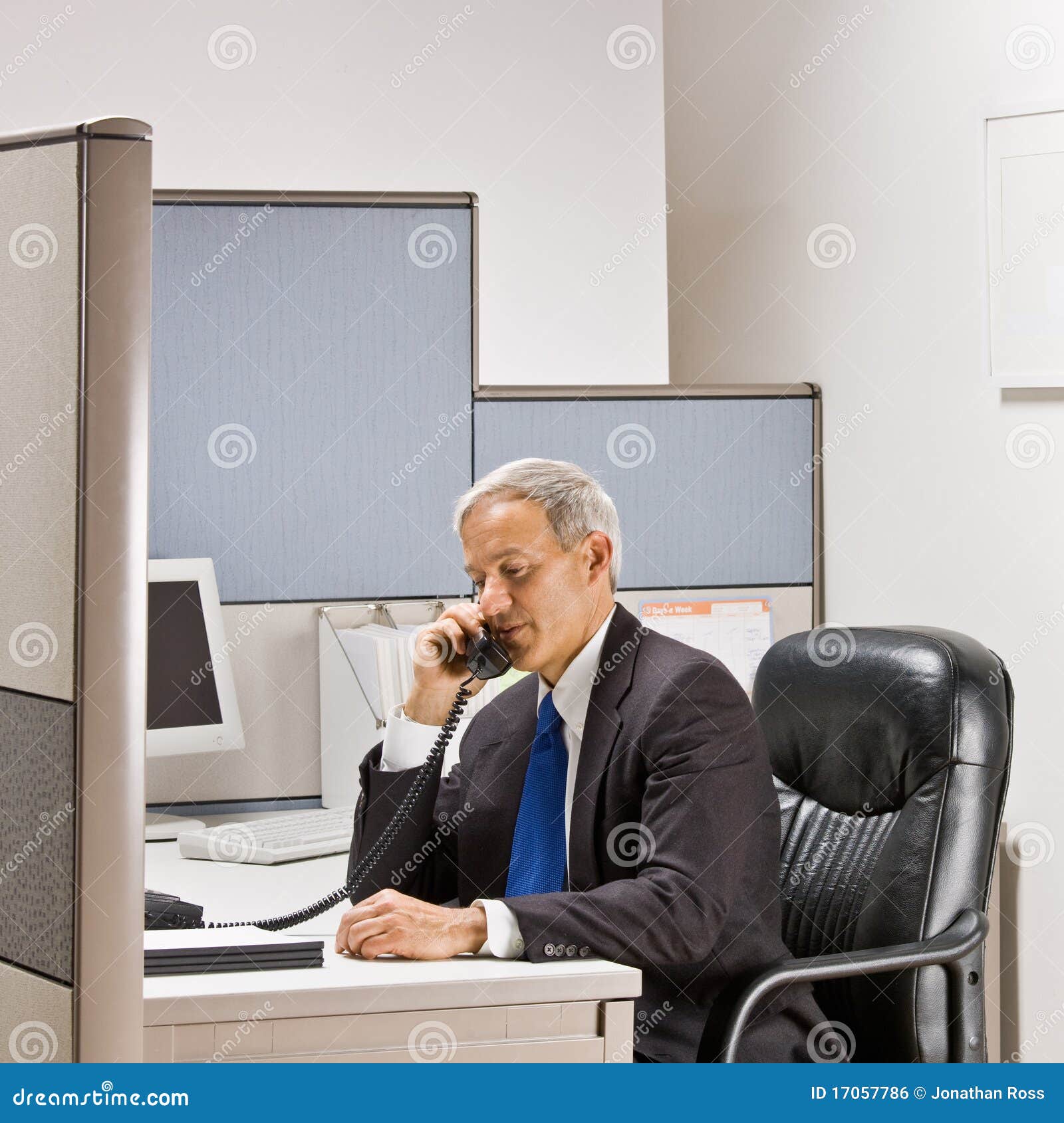 Businessman Talking on Telephone at Desk Stock Photo - Image of male ...