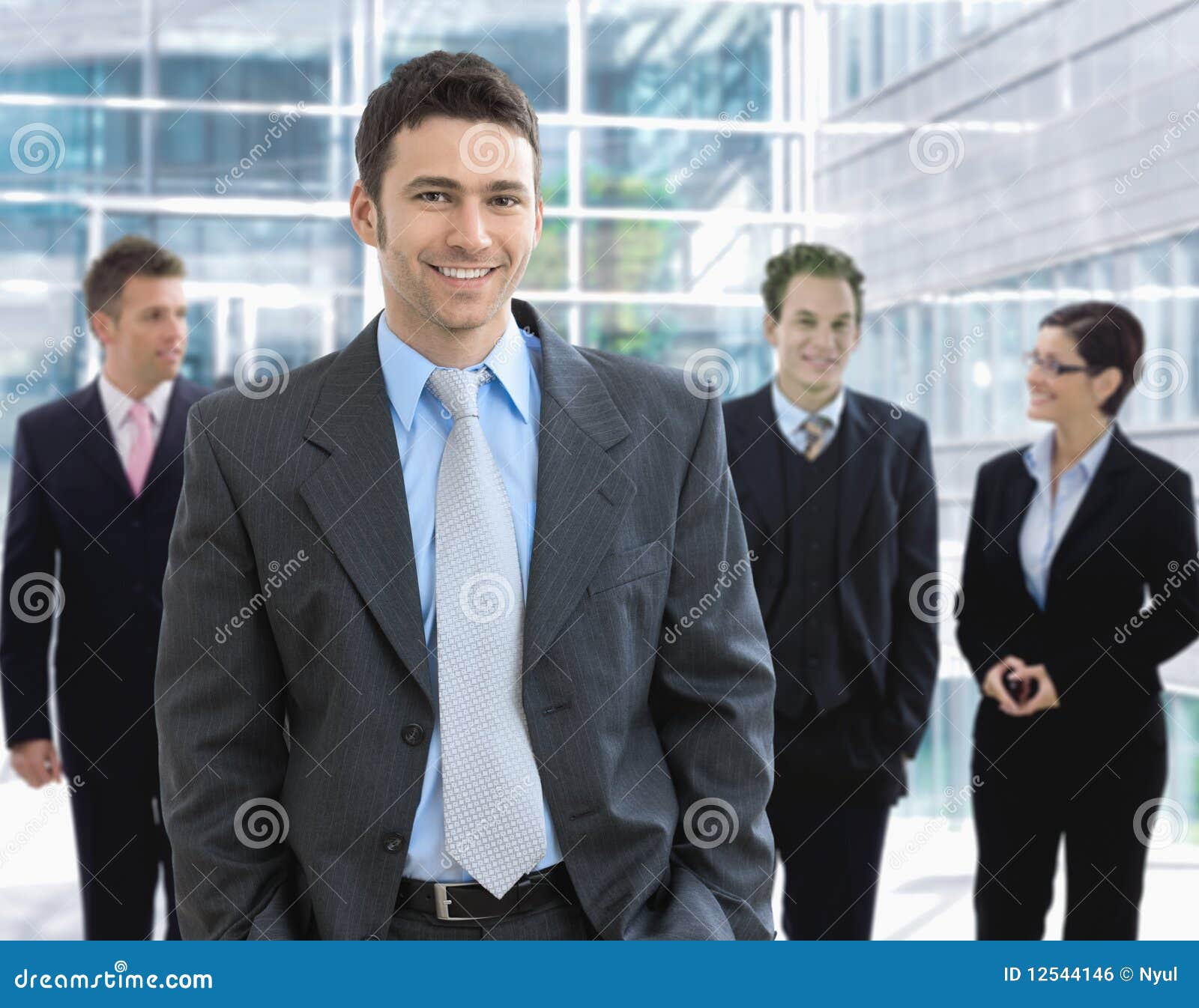 Businessman and team stock photo. Image of female, clothing - 12544146