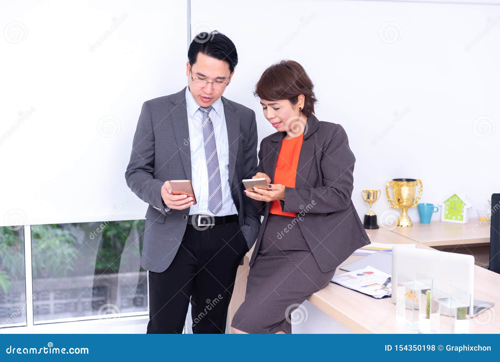 Businessman and Teamwork Working on Mobile for Business Stock Photo ...
