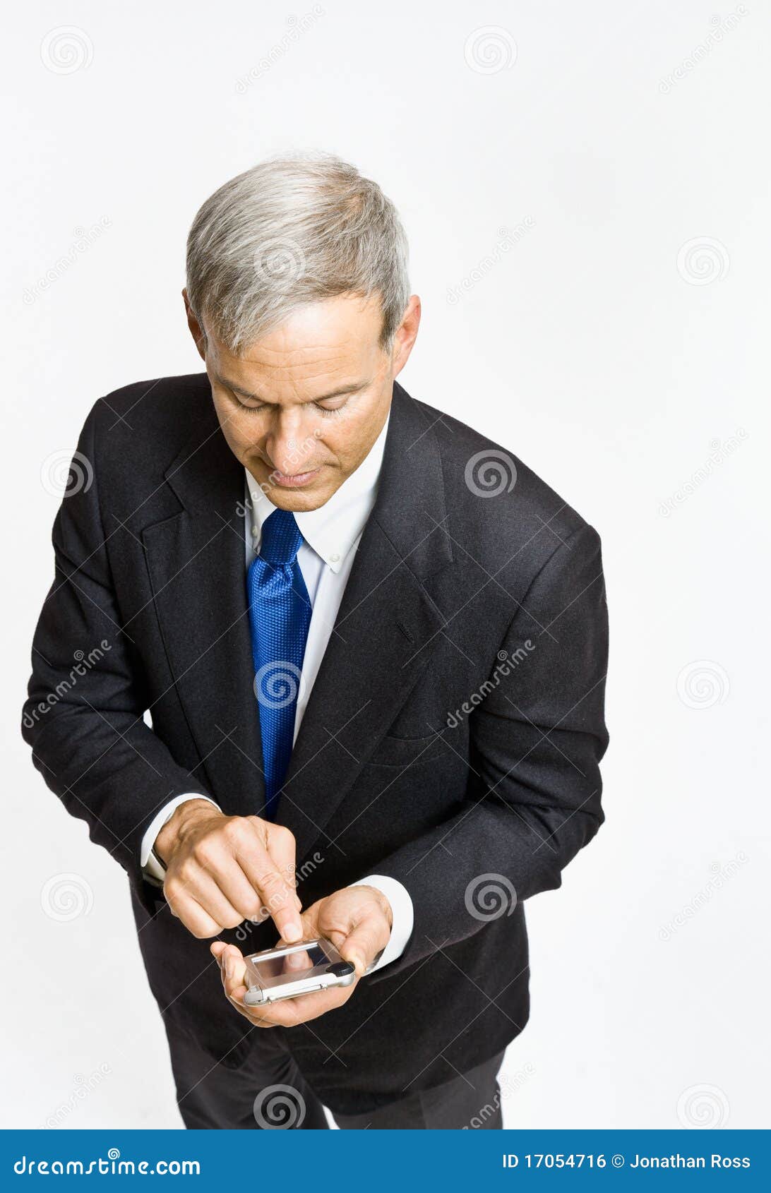 Businessman Text Messaging on Cell Phone Stock Photo - Image of male ...