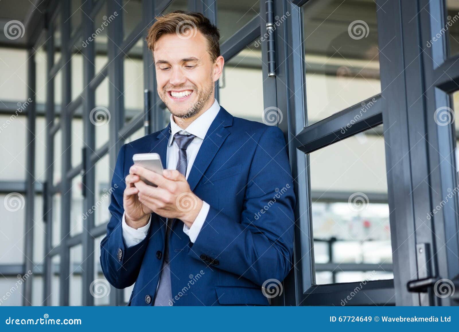 Businessman Text Messaging on Smartphone Stock Image - Image of ...