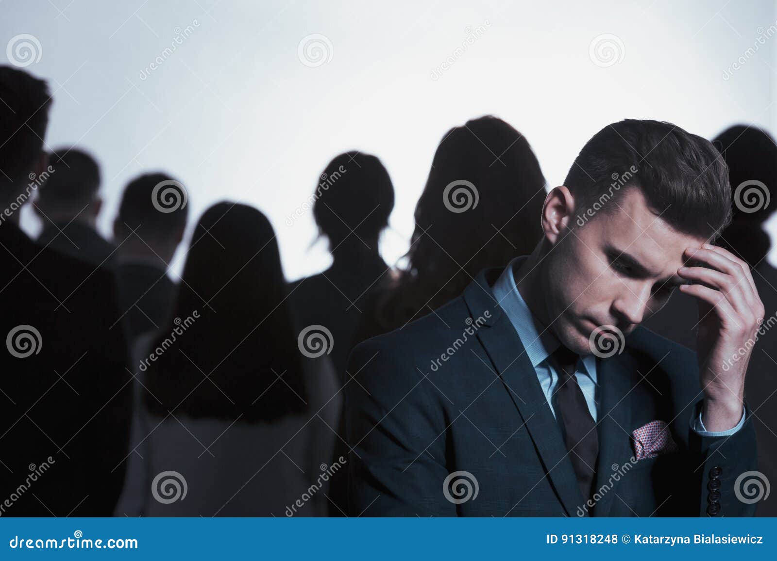 Businessman Thinking in a Crowd Stock Photo - Image of blurred, crowded ...