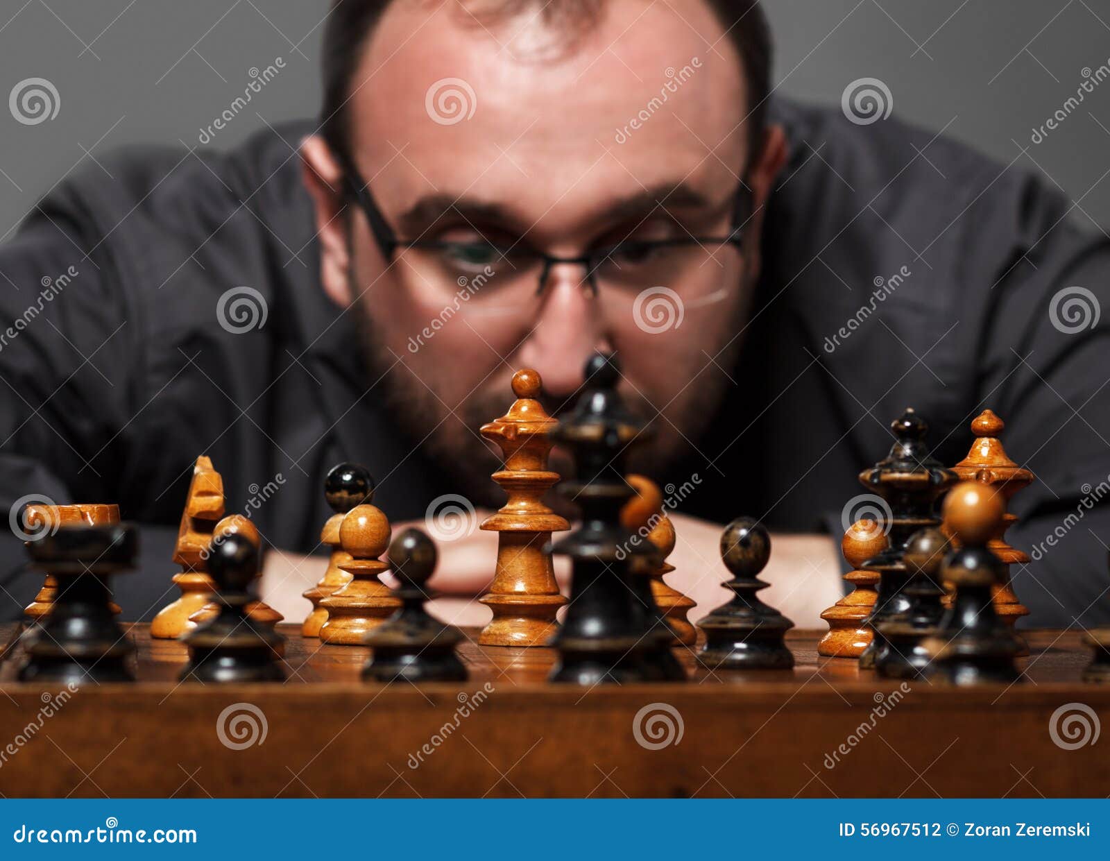 Businessman Thinking about Her Next Move in a Game of Chess Stock Photo ...