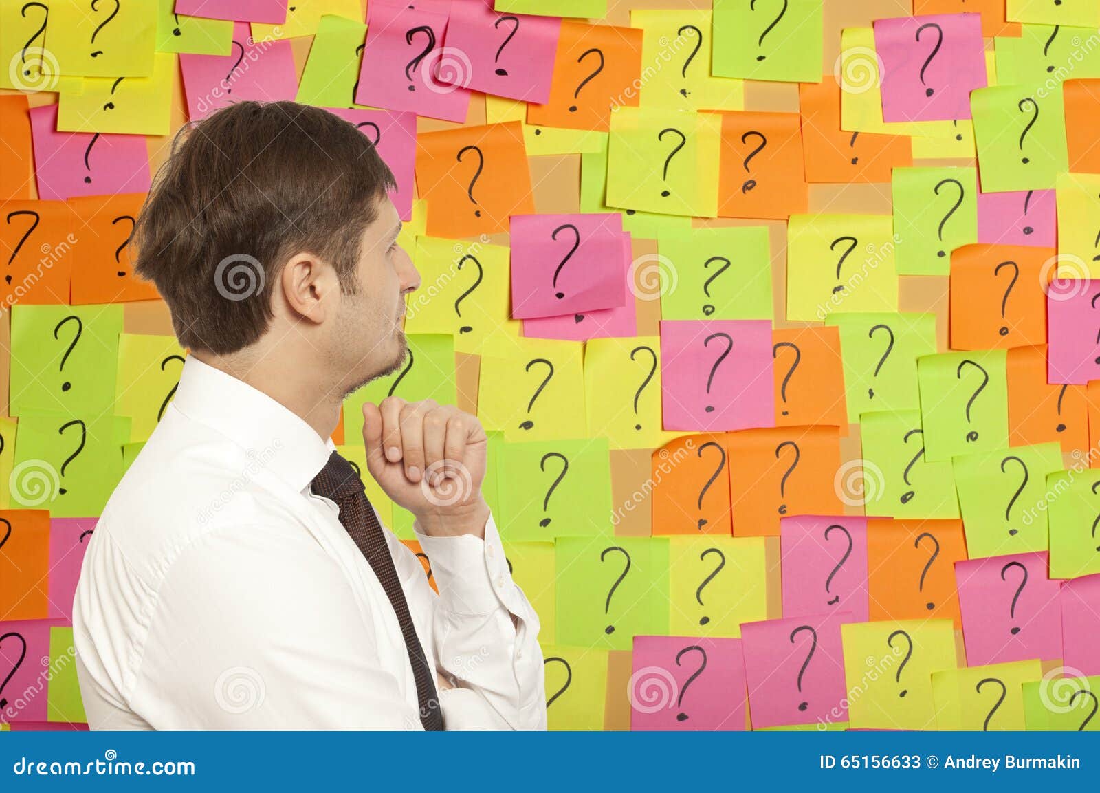 Businessman Thinking with Question Marks Written Stock Image - Image of ...