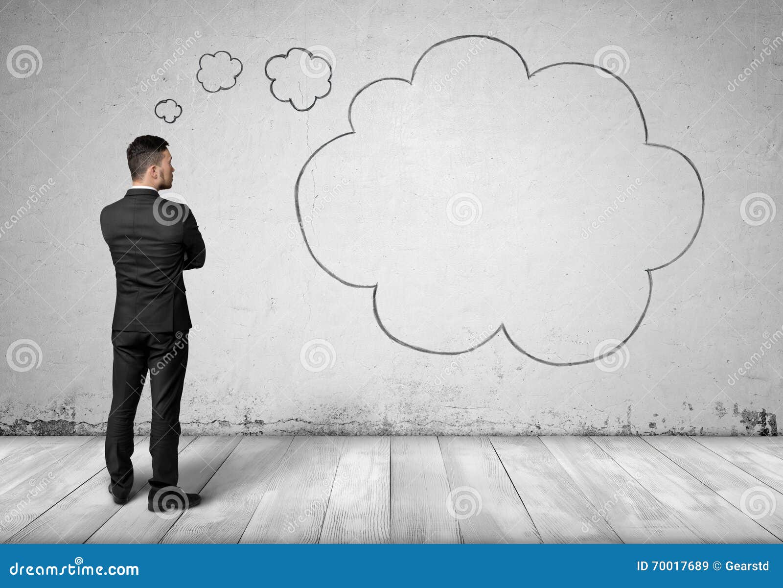 Businessman and Thought Clouds on Concrete Wall Background Stock Image ...